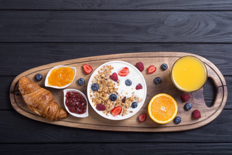 Breakfast on rustic table stock photo. Image of health - 125545546