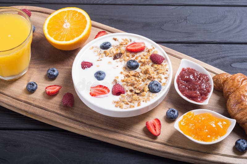 Breakfast on rustic table stock image. Image of hotel - 125545585