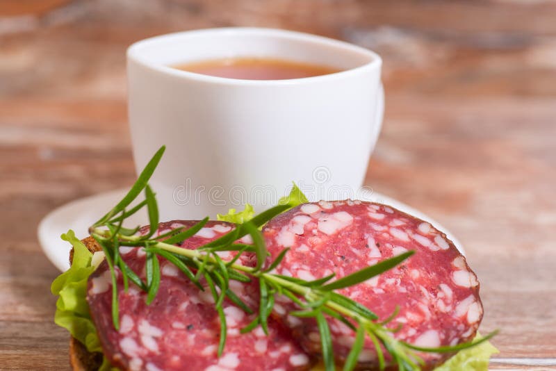 Breakfast with Salami Sandwich and Cup of Tea Stock Image - Image of ...
