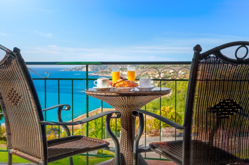 Breakfast on the balcony stock image. Image of meal - 232432083
