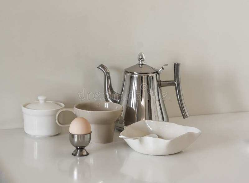 Breakfast Serving - Coffee Pot, Ceramic Mug and Bowl, Boiled Egg on a ...