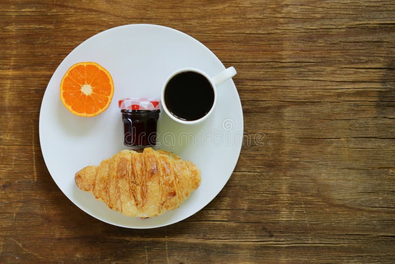 Breakfast Serving Funny Face on the Plate (jam, Croissant, Orange ...