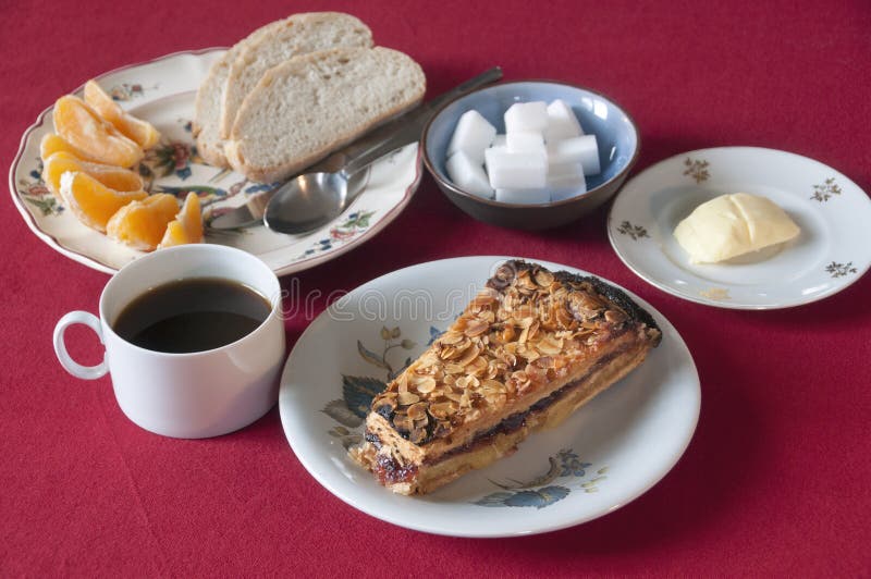 Breakfast Set with Cake, Coffee, Bread Butter and Orange Stock Photo ...