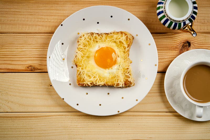 Breakfast Set with Coffee and Toast with Egg on Wooden Table Stock ...