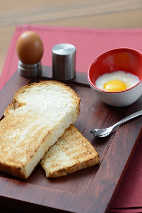 Breakfast Set Consisting Toast Bread and Half-boiled Egg Stock Image ...