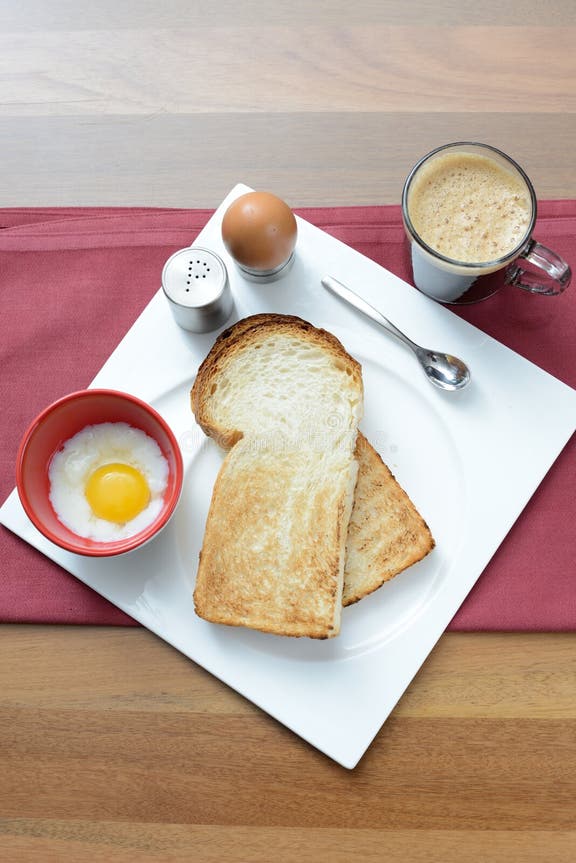 Breakfast Set Consisting Toast Bread and Half-boiled Egg Stock Image ...