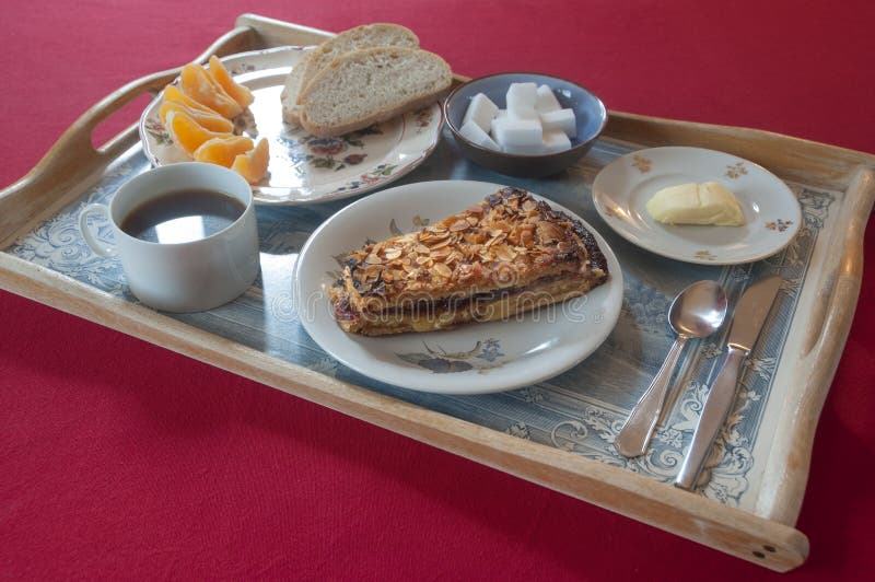 Breakfast Set on a Decorated Tray with Cake, Coffee, Bread, Butter and ...