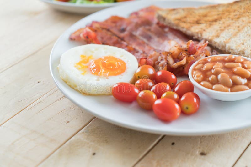 Breakfast set on wood stock image. Image of full, plate - 85382503