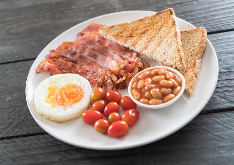 Breakfast set on wood stock photo. Image of bread, tomato - 85385816