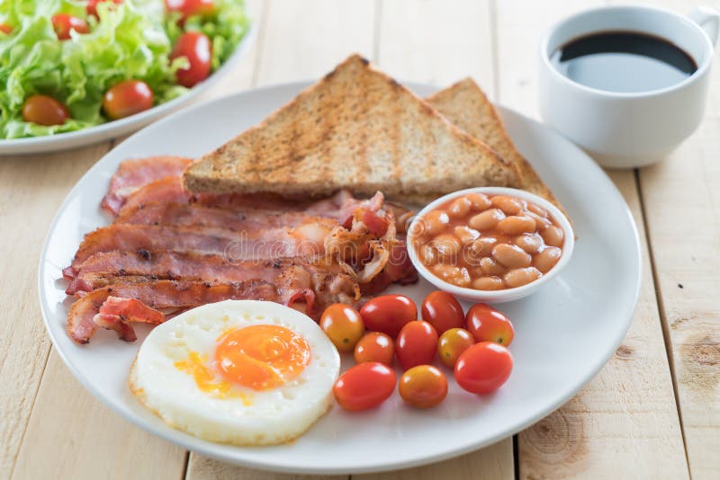 Breakfast set on wood stock photo. Image of salad, plate - 85385844