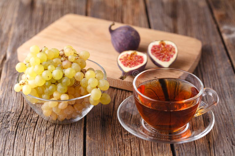 Breakfast Setting with Tea, Bread, Figs and Honey Stock Photo - Image ...
