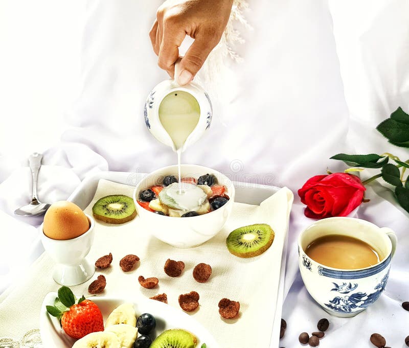 Breakfast on the sofa stock image. Image of berryfruit - 209755957