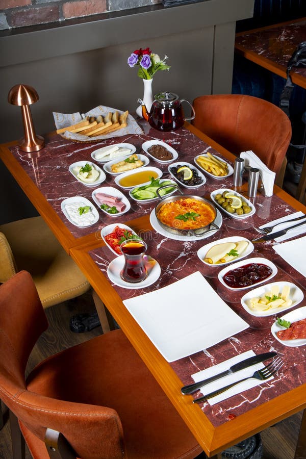 Breakfast Spread on a Table Featuring Various Dishes and Drinks at a ...