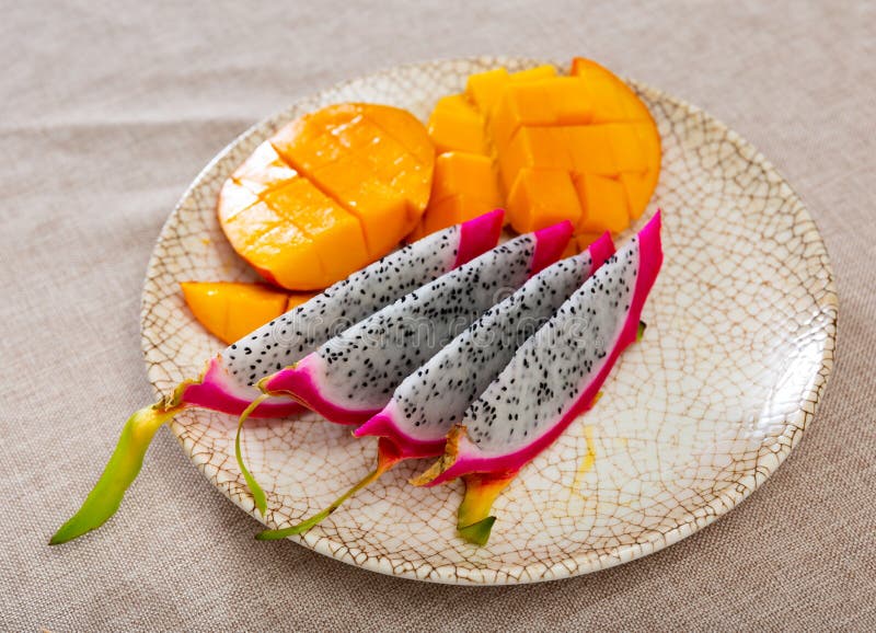 Mango plate on beach stock image. Image of fish, gourmet - 281863533
