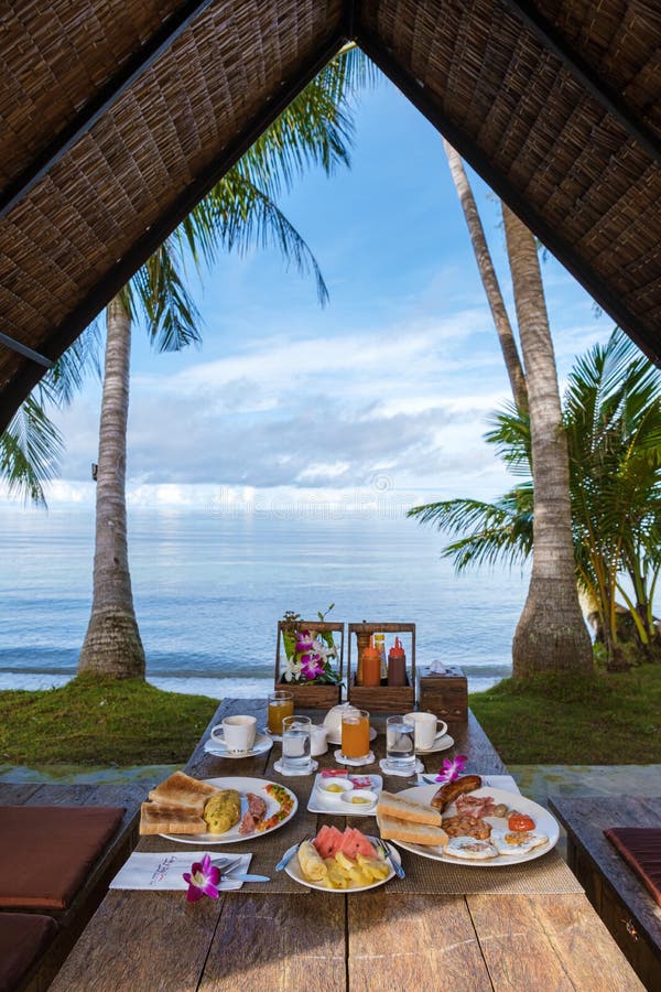 Breakfast Table on the Beach with Palm Trees in Thailand Stock Image ...