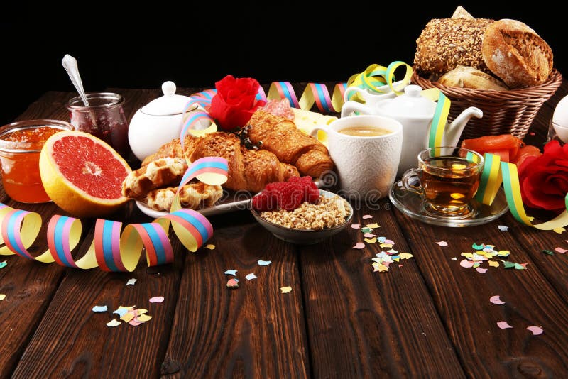 Breakfast on Table with Bread Buns, Croissants, Coffe and Juice on ...