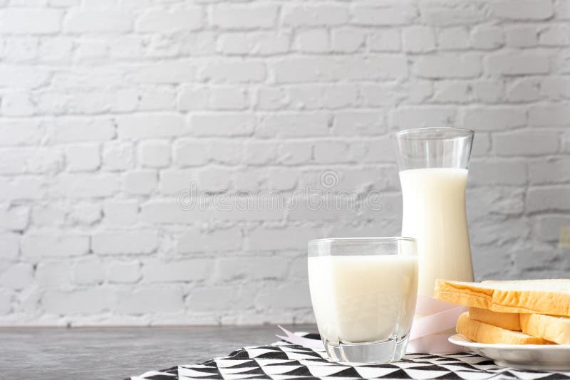 Breakfast Table with Glass of Milk, Jug of Milk Stock Image - Image of ...