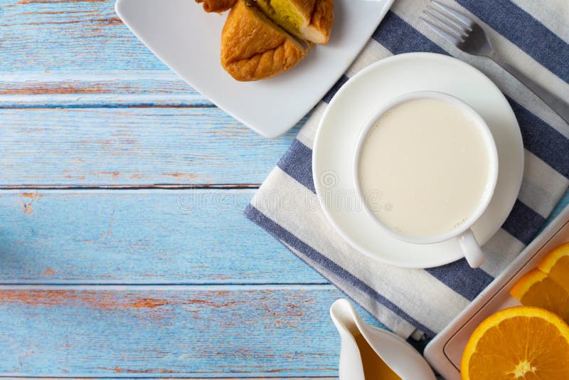 Breakfast Table with Milk and Sliced Orange Stock Photo - Image of ...