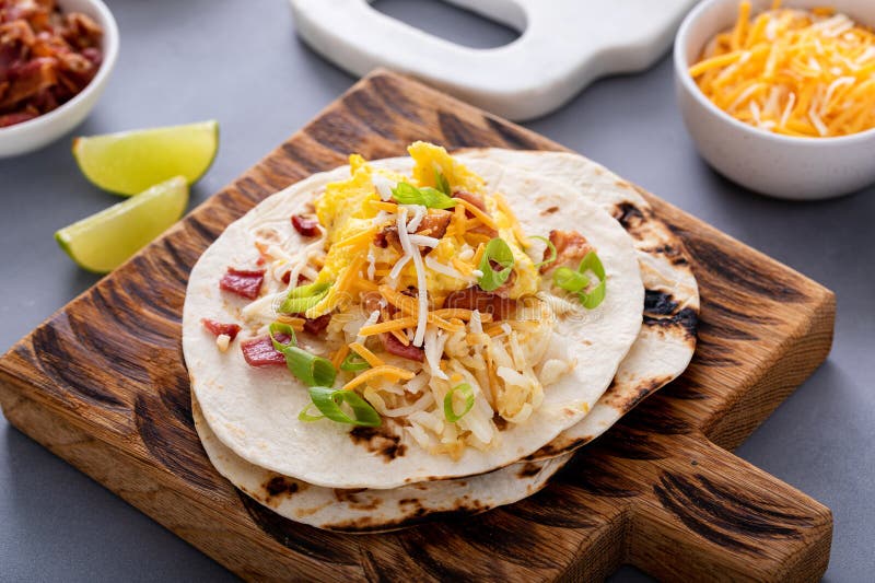 Breakfast Tacos with Hash Browns, Eggs and Bacon Stock Photo - Image of ...
