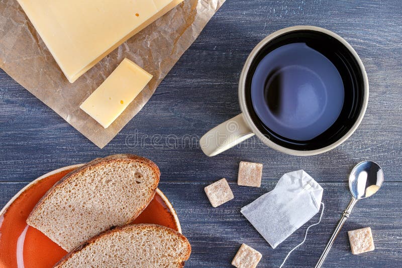 Breakfast Tea with Cheese, Bread on Wooden Table Stock Photo - Image of ...