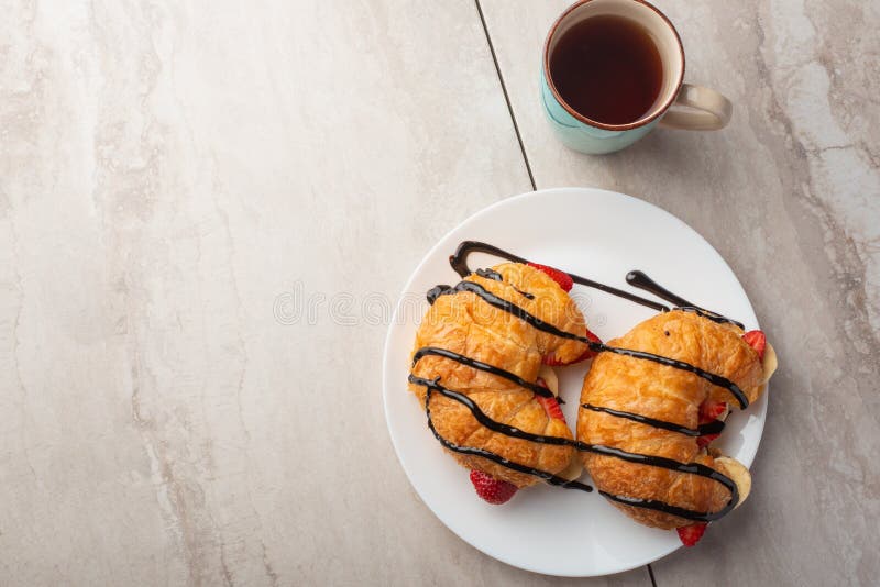 Breakfast with Tea, Croissant, Bananas and Strawberries. Top View, Flat ...