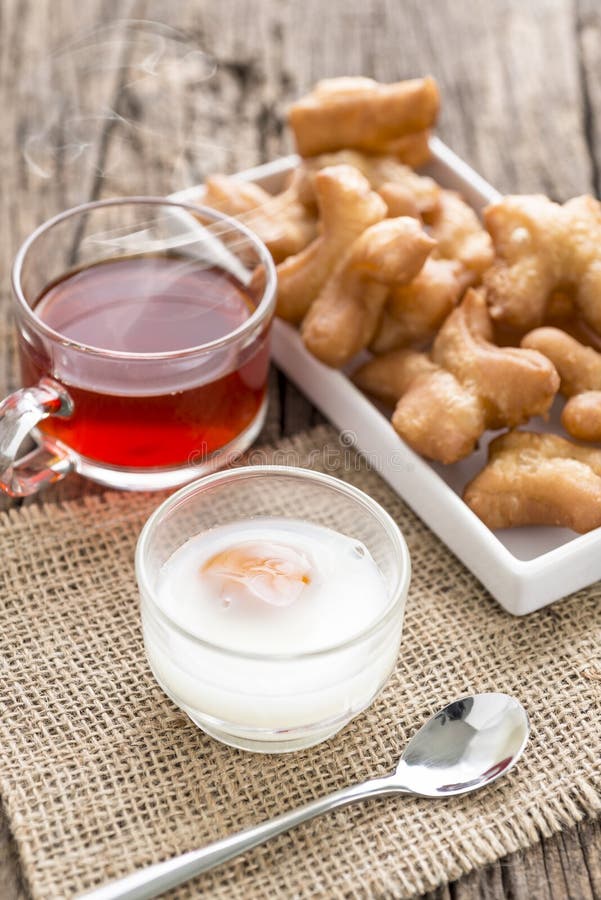 Breakfast with Tea , Soft Boiled Egg and Deep-fried Dough Stick on ...