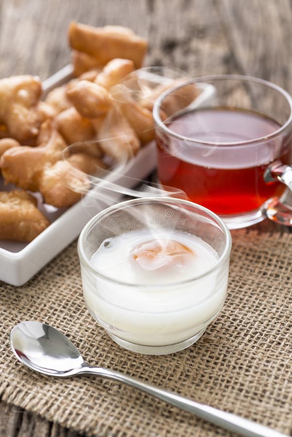 Breakfast with Tea , Soft Boiled Egg and Deep-fried Dough Stick on ...
