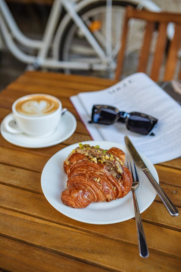 Breakfast Time with Croissant, Coffee, and Magazine Stock Photo - Image ...