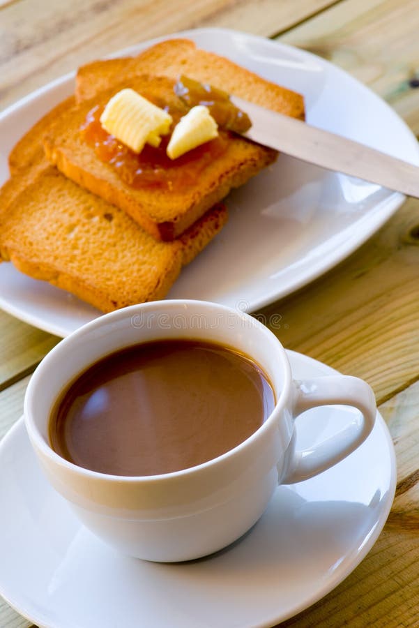 Breakfast Time: Cup of Milky Coffee, Rusks with Butter and Jam Stock ...
