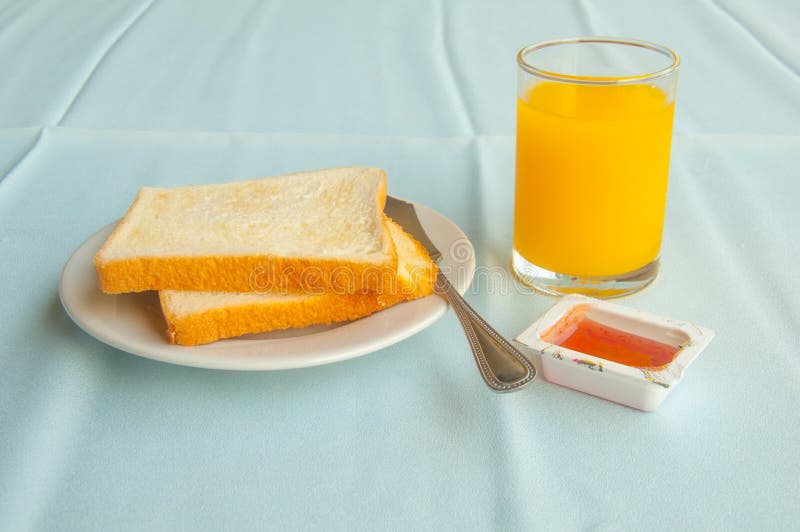 Breakfast with Toasts, Jam and Orange Juice Stock Photo - Image of ...