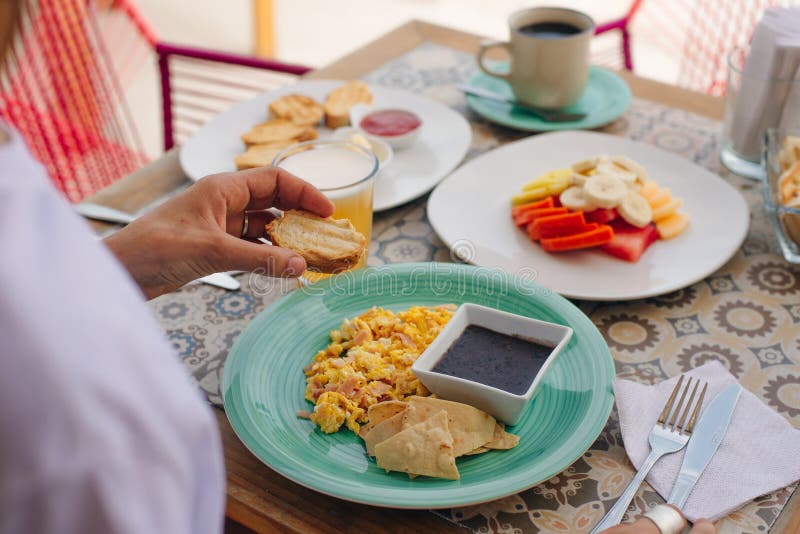 Breakfast for Tourist in the Hotel with Eggs, Toast and Fruit Stock ...