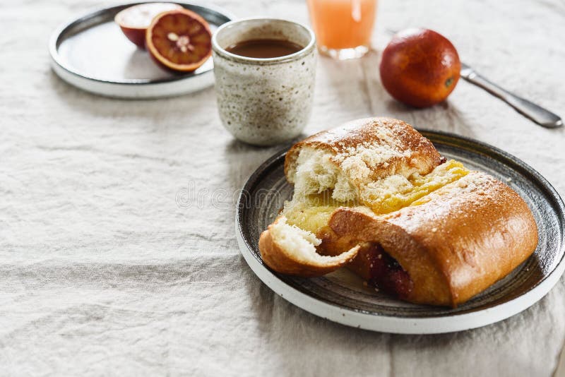 Breakfast with Twisted Bun with Cheese and Jam, Juice and Oranges Stock ...
