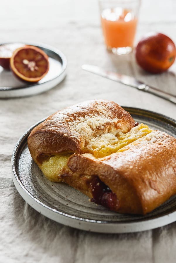 Breakfast with Twisted Bun with Cheese and Jam, Juice and Oranges Stock ...