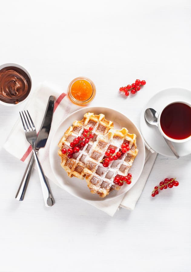 Breakfast Waffle with Berry, Jam, Chocolate Spread and Tea. Top View ...