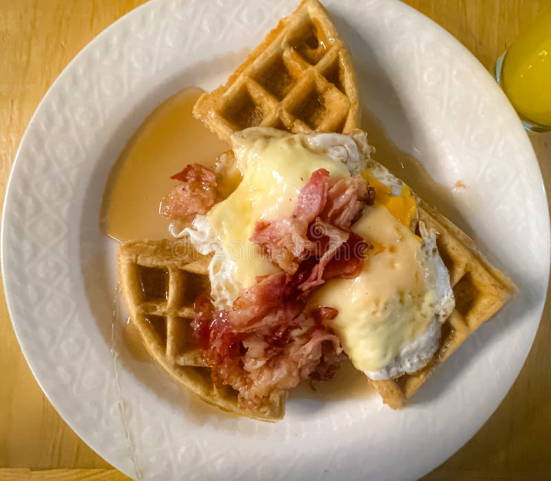 Breakfast of Waffles with Fried Egg, Bacon with Maple Syrup Stock Image ...