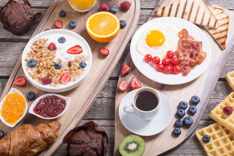 Breakfast on rustic table stock image. Image of food - 126120229