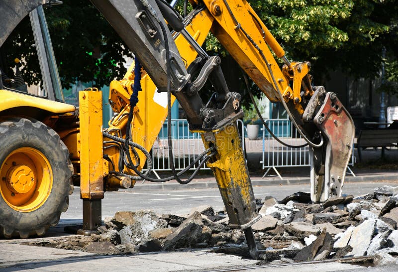 Breaking the Asphalt on the Road Construction Stock Photo - Image of ...