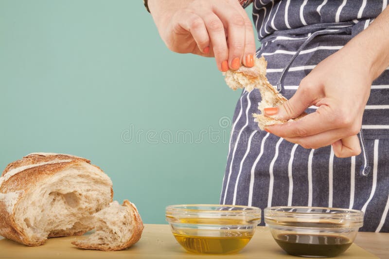 Breaking Bread stock photo. Image of olive, taste, finger - 10966992