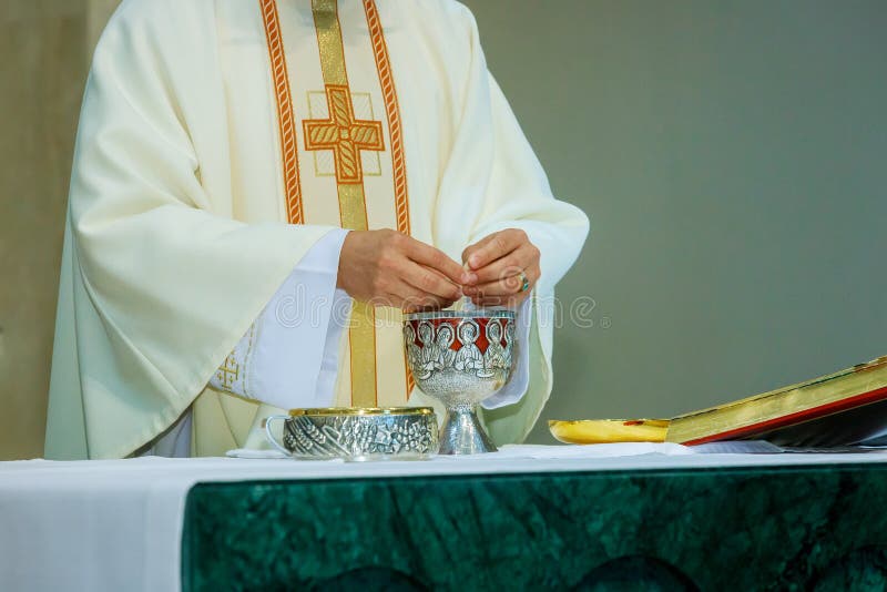 Breaking the Bread in the Church during the Communion Stock Photo ...