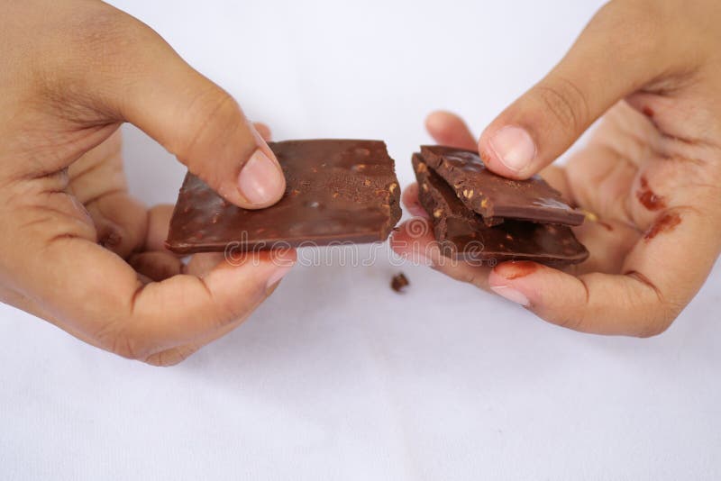 Breaking Dark Chocolate with Hand Slow Motion Stock Image - Image of ...
