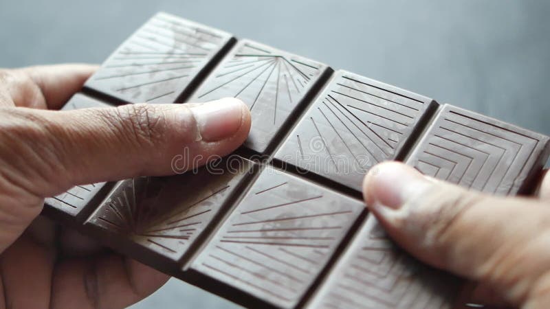 Breaking Dark Chocolate with Hand Slow Motion Stock Video - Video of ...