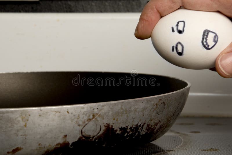 Breaking an Egg stock photo. Image of breakfast, eggs - 14082070