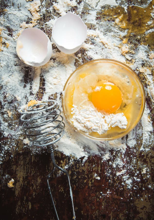 Breaking the egg stock image. Image of kitchen, table - 66491667