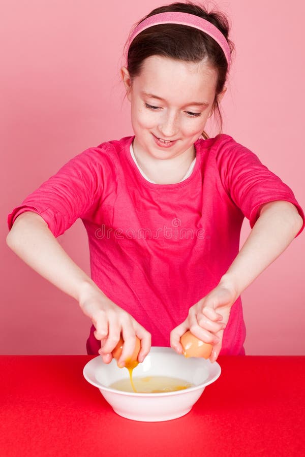 Breaking eggs stock photo. Image of years, pink, ingredient - 14058898