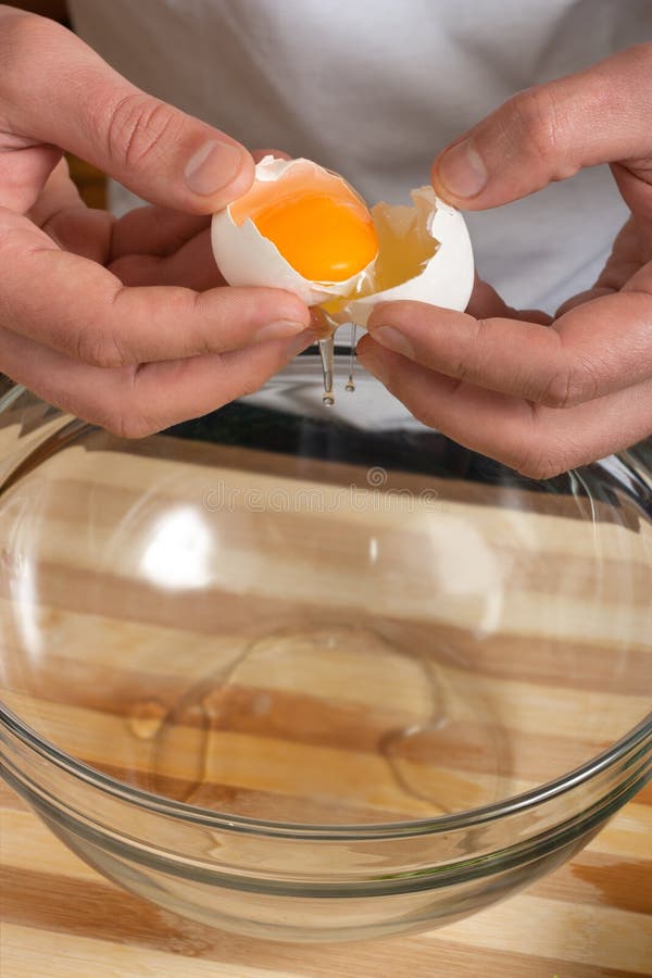 Breaking eggs for cooking stock photo. Image of break - 55996410