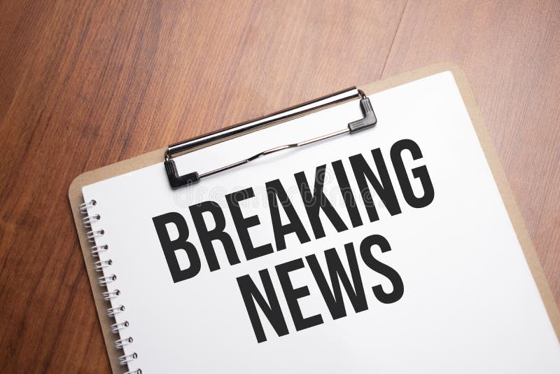 Breaking News Text on White Paper on the Wood Table Stock Photo - Image ...