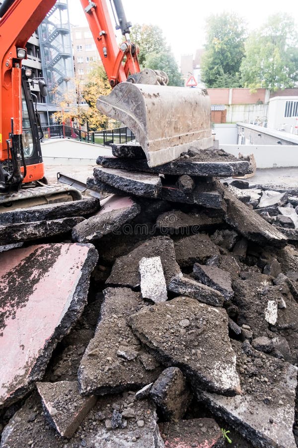 Breaking out asphalt stock photo. Image of cement, drill - 163698670