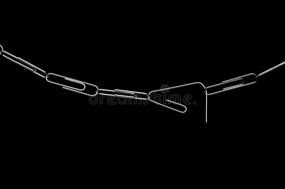 Breaking Paperclip Chain on Black Stock Photo - Image of paperclip ...