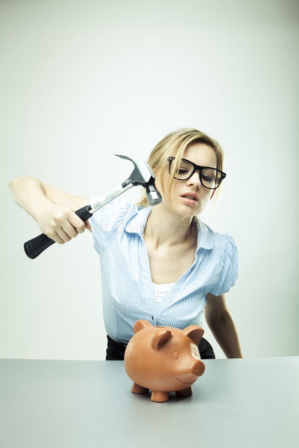 Breaking a piggy bank stock image. Image of crisis, break - 14953485