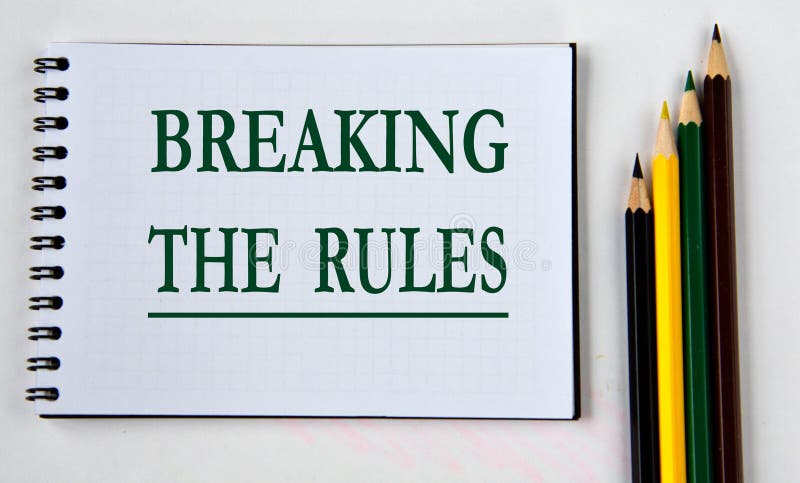BREAKING the RULES - Words in White Notebook on White Background with ...
